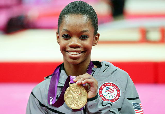 Gabby Douglas Biting Gold Medal